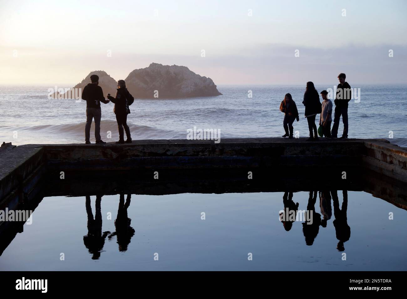 Visitors walk along Sutro Baths, once the world's largest indoor ...