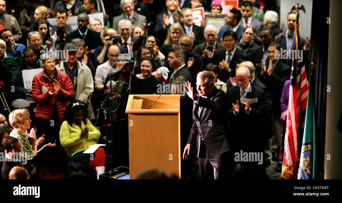 New Seattle Mayor Ed Murray waves as he finishes speaking during an ...