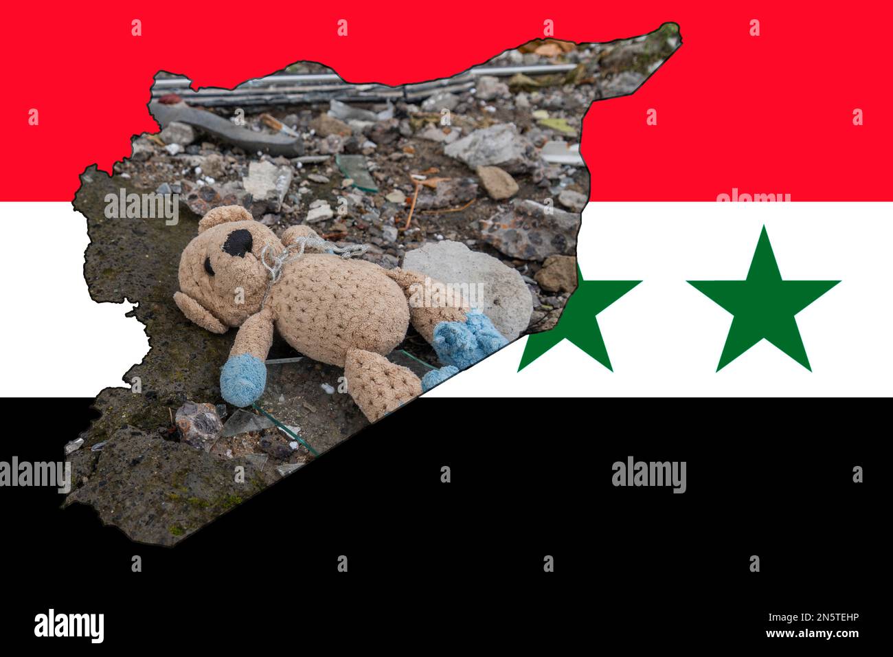 Teddy bear lies on fragments of glass and concrete. Picture in form of ...