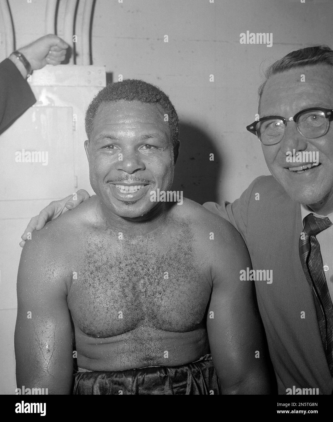 Boxer Archie Moore is shown in dressing room after beating Tony Anthony ...