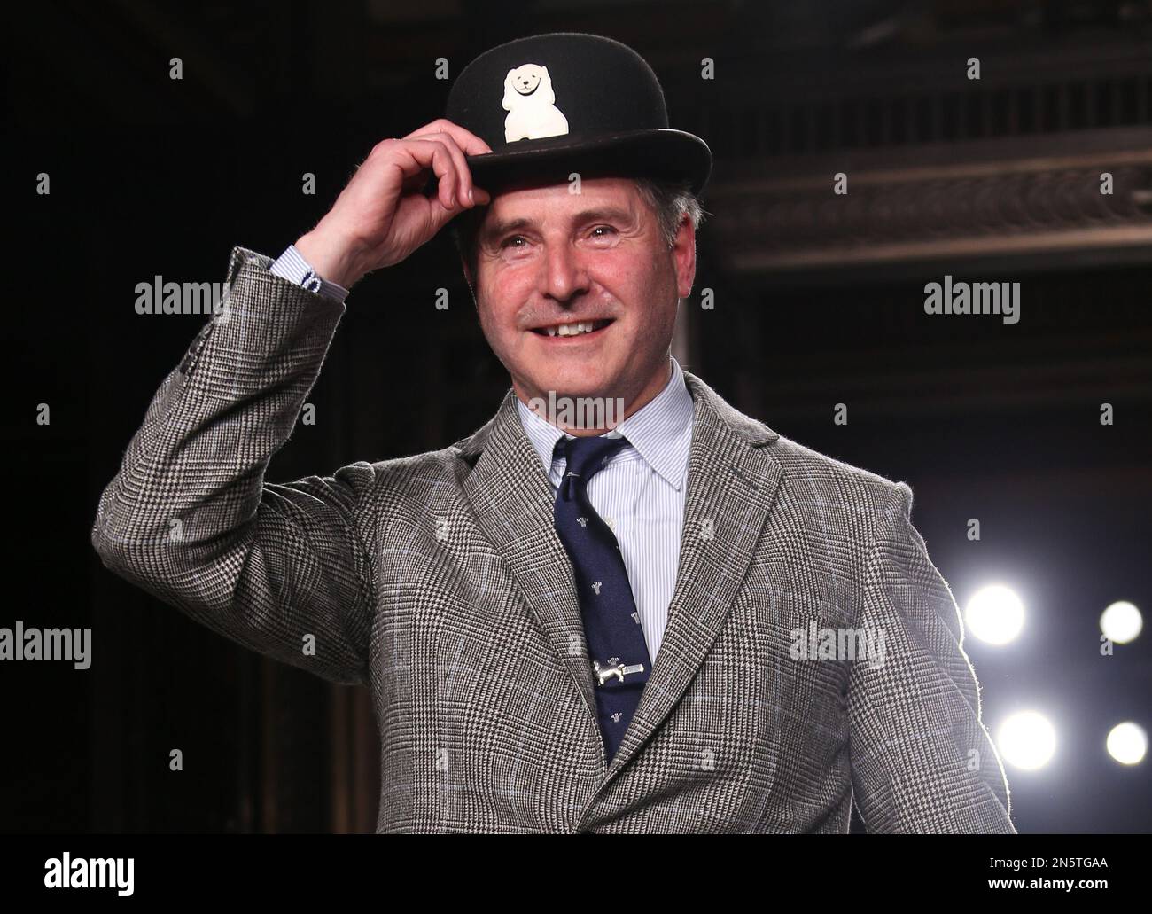 Fashion Designer Jeremy Hackett tips his hat following his Hackett show ...