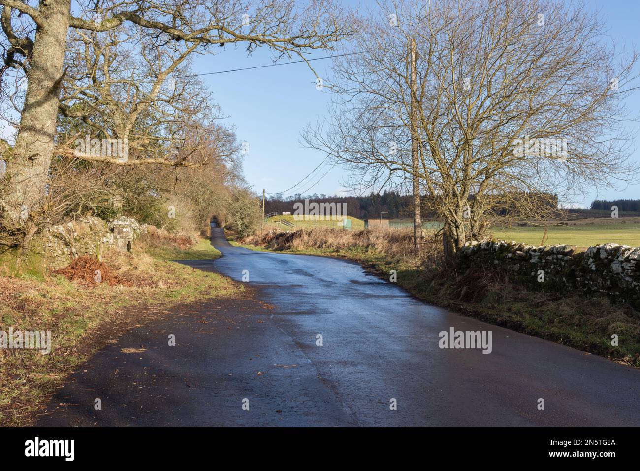 The Rob Roy Way walking trail, sharing the road heading north from ...