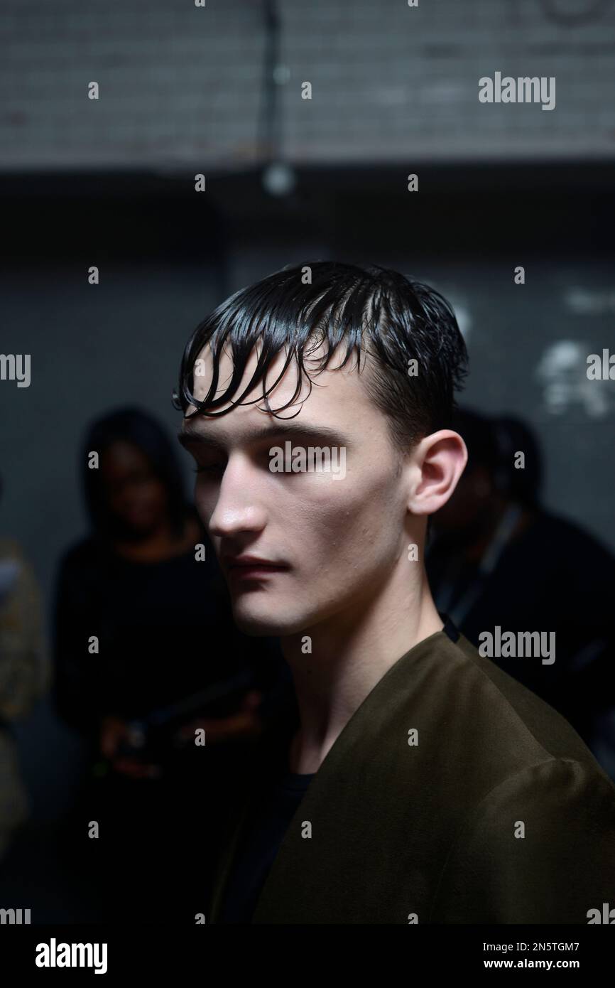A model wears a design from the Lee Roach collection backstage during ...