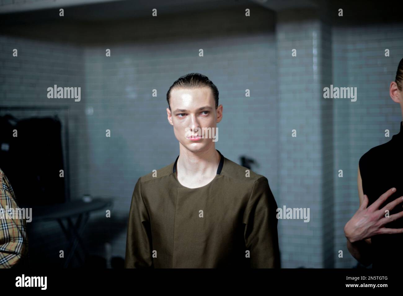 A model wears a design from the Lee Roach collection backstage during ...