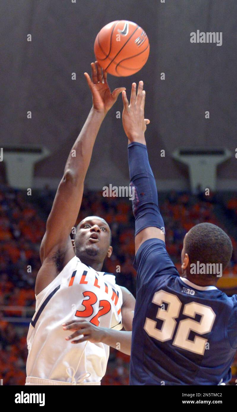 Illinois' Nnanna Egwu (32), left, and Penn State's Jordan Dickerson ...