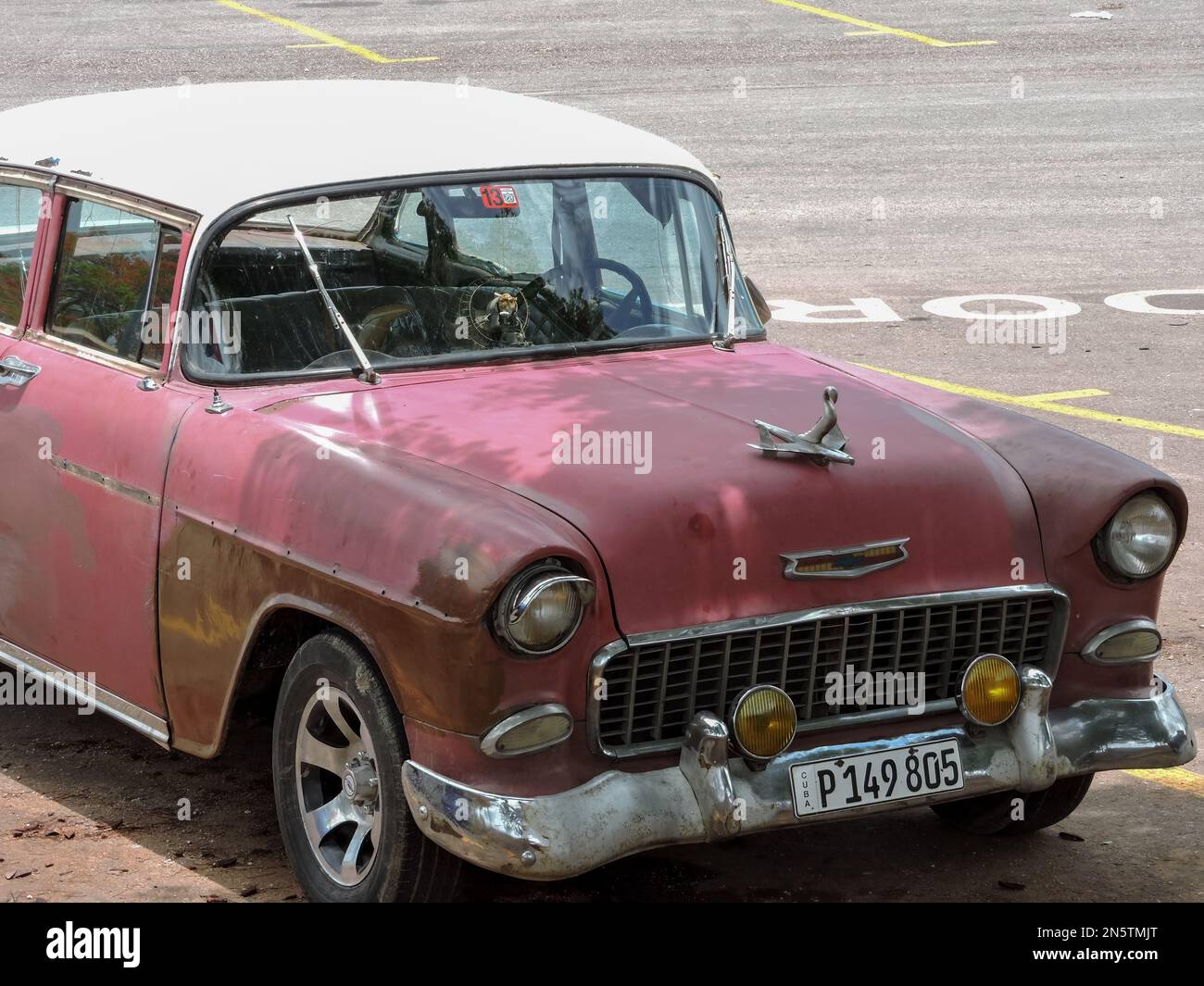 Red coloured oldtimer parked on the street, Cuba Stock Photo - Alamy