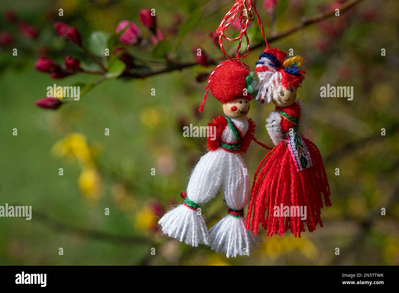 Greeting card background for the arrival of spring. Red-white man and ...