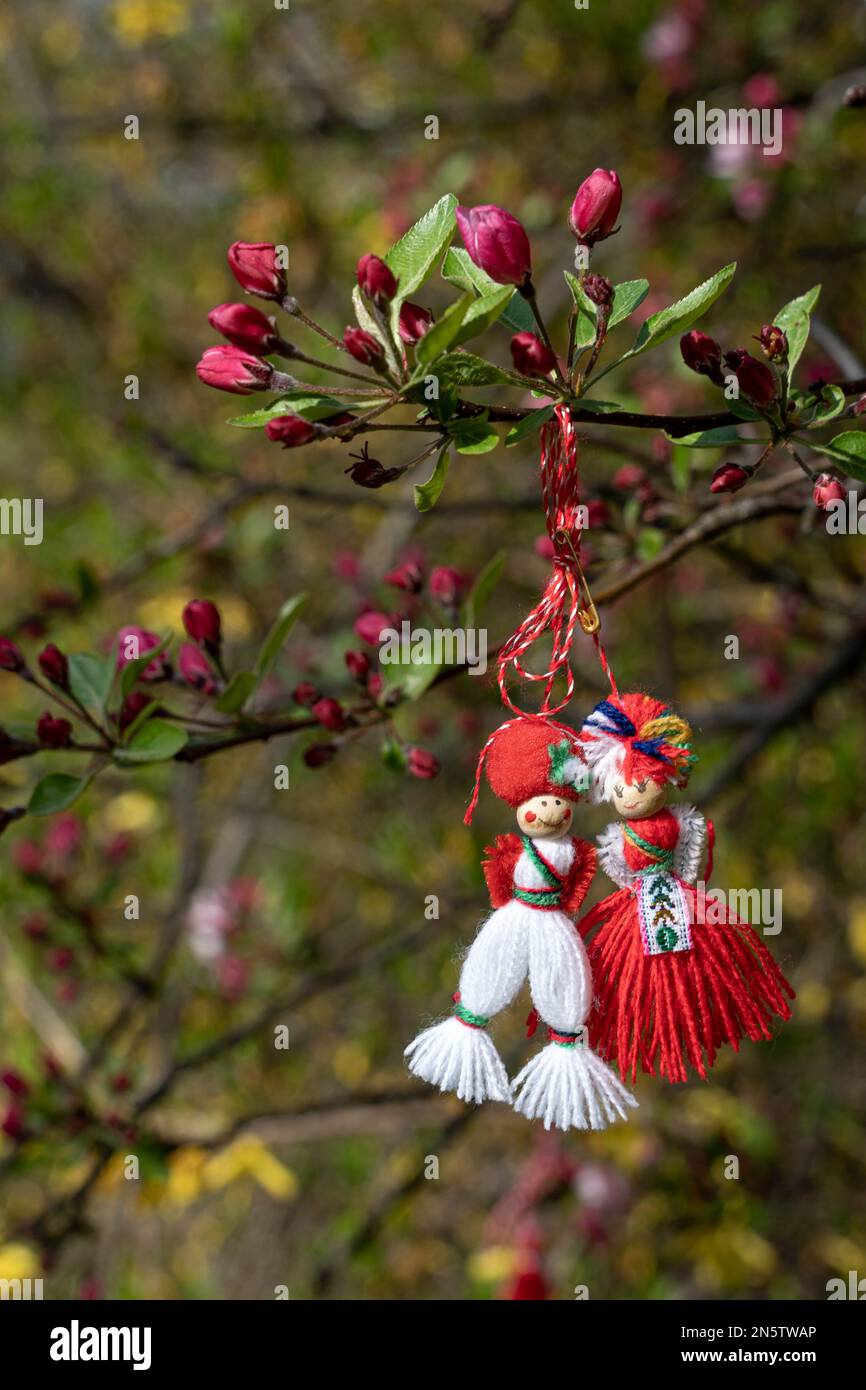 Greeting card background for the arrival of spring. Red-white man and ...