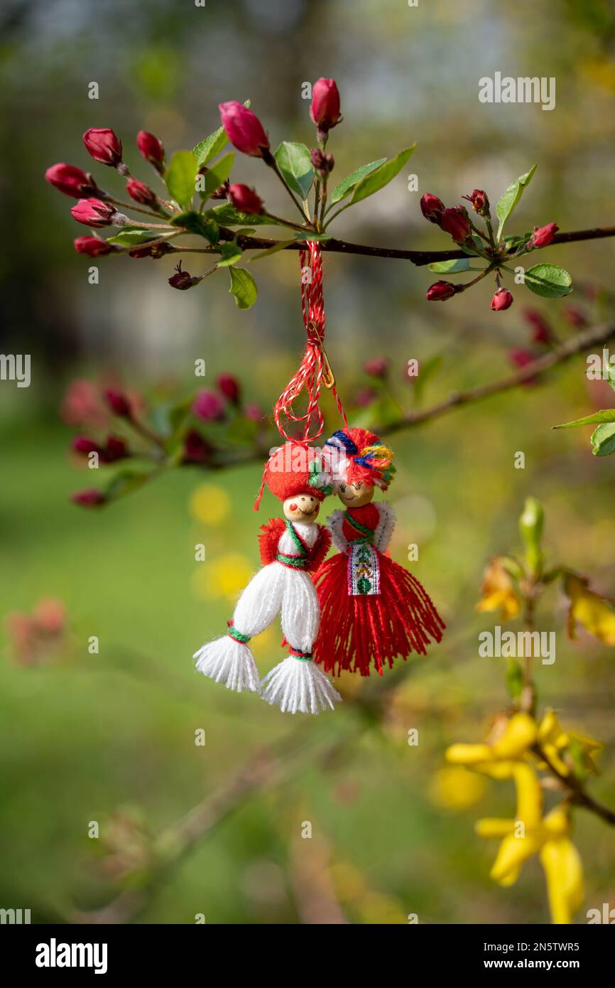 Greeting card background for the arrival of spring. Red-white man and ...
