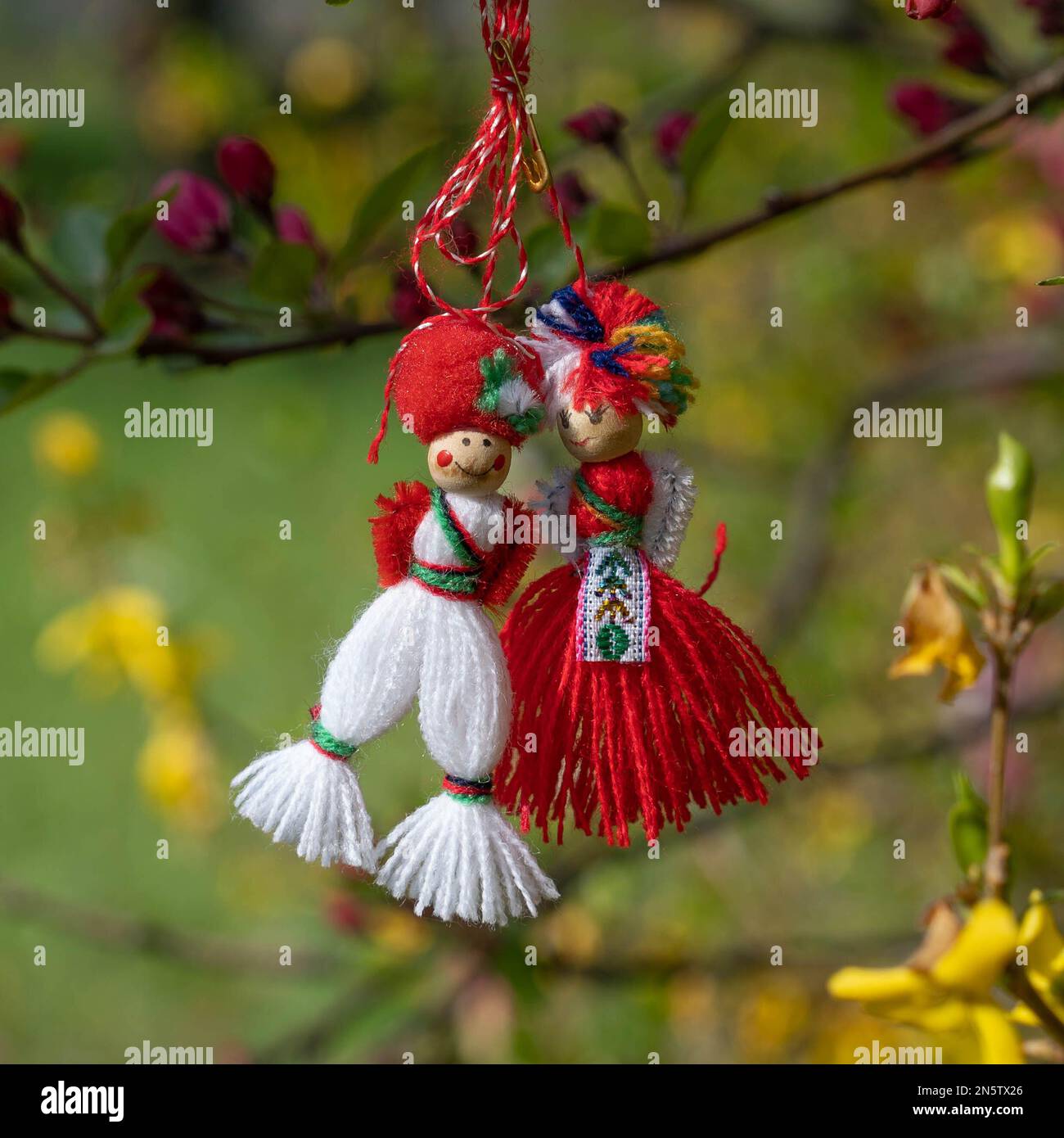 Greeting card background for the arrival of spring. Red-white man and ...