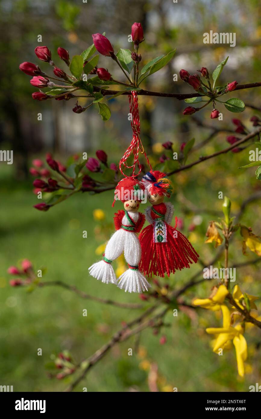Greeting card background for the arrival of spring. Red-white man and ...