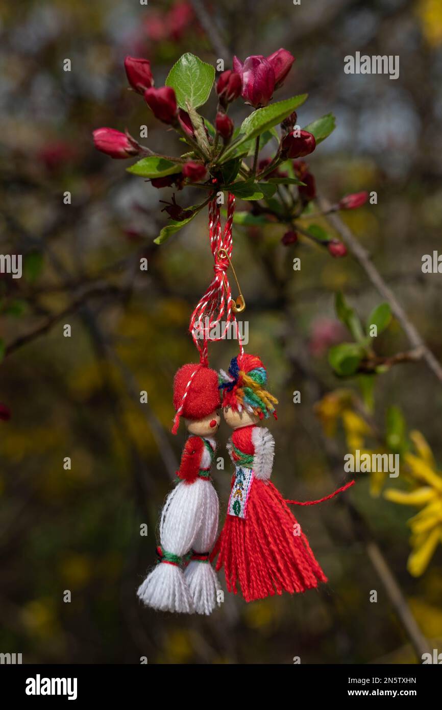 Greeting card background for the arrival of spring. Red-white man and ...