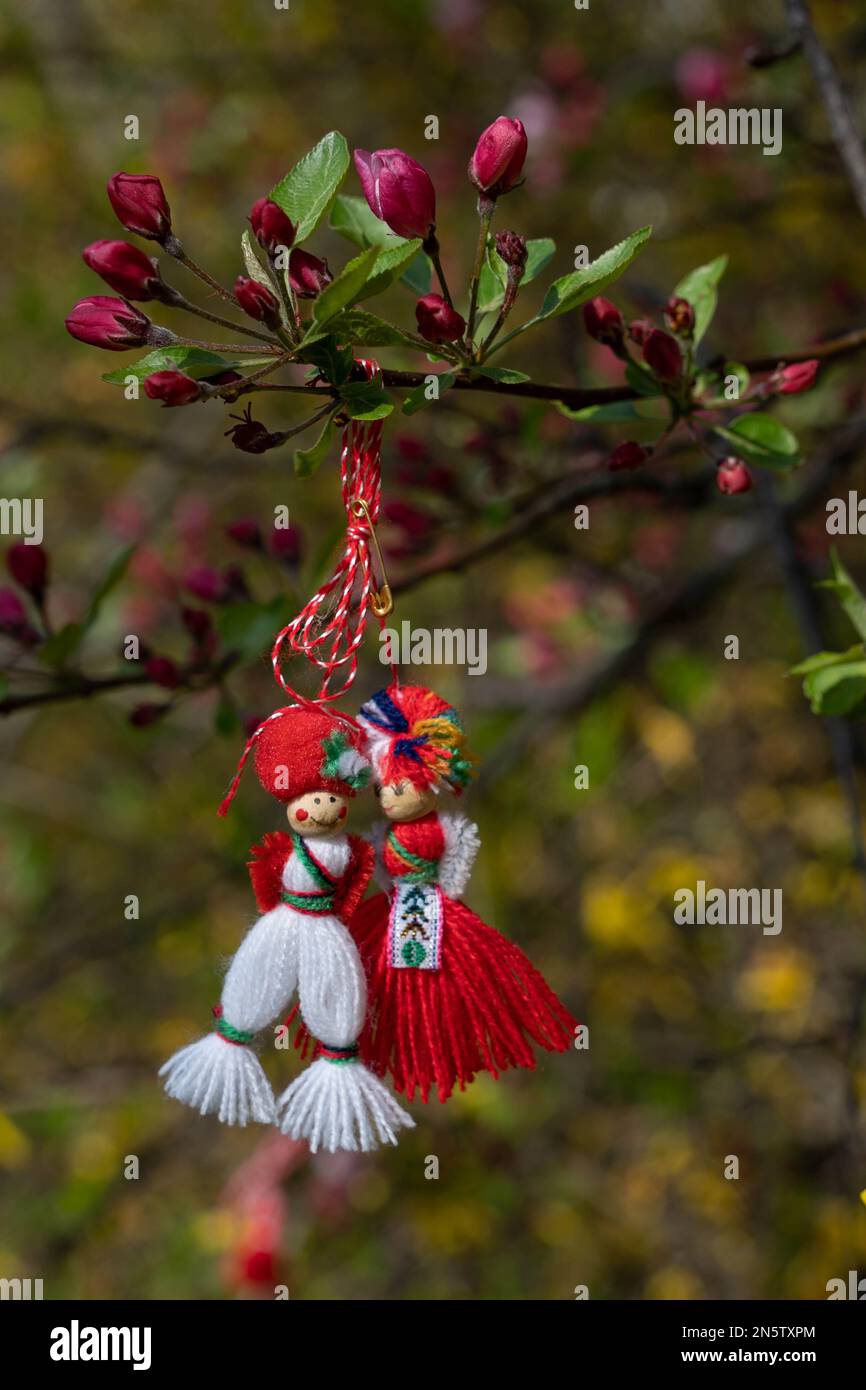 Greeting card background for the arrival of spring. Red-white man and ...