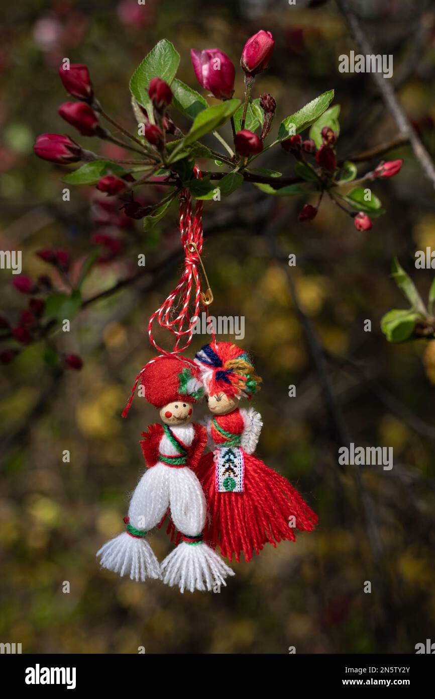 Greeting card background for the arrival of spring. Red-white man and ...