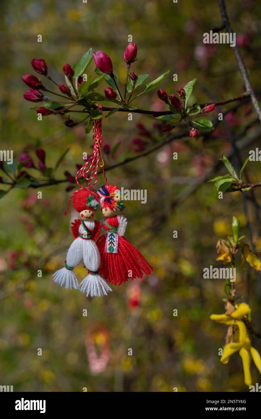 Greeting card background for the arrival of spring. Red-white man and ...