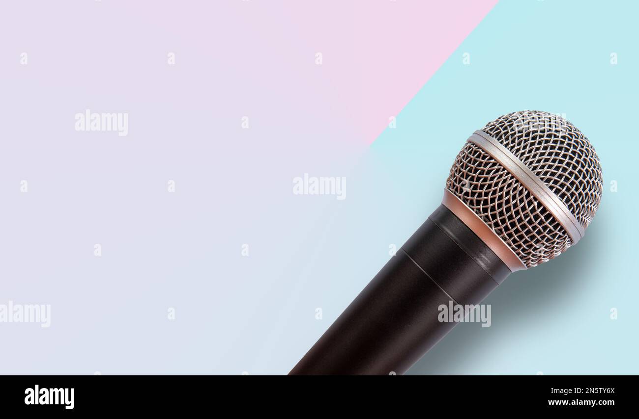 directional microphone isolated on colored background with copy space ...