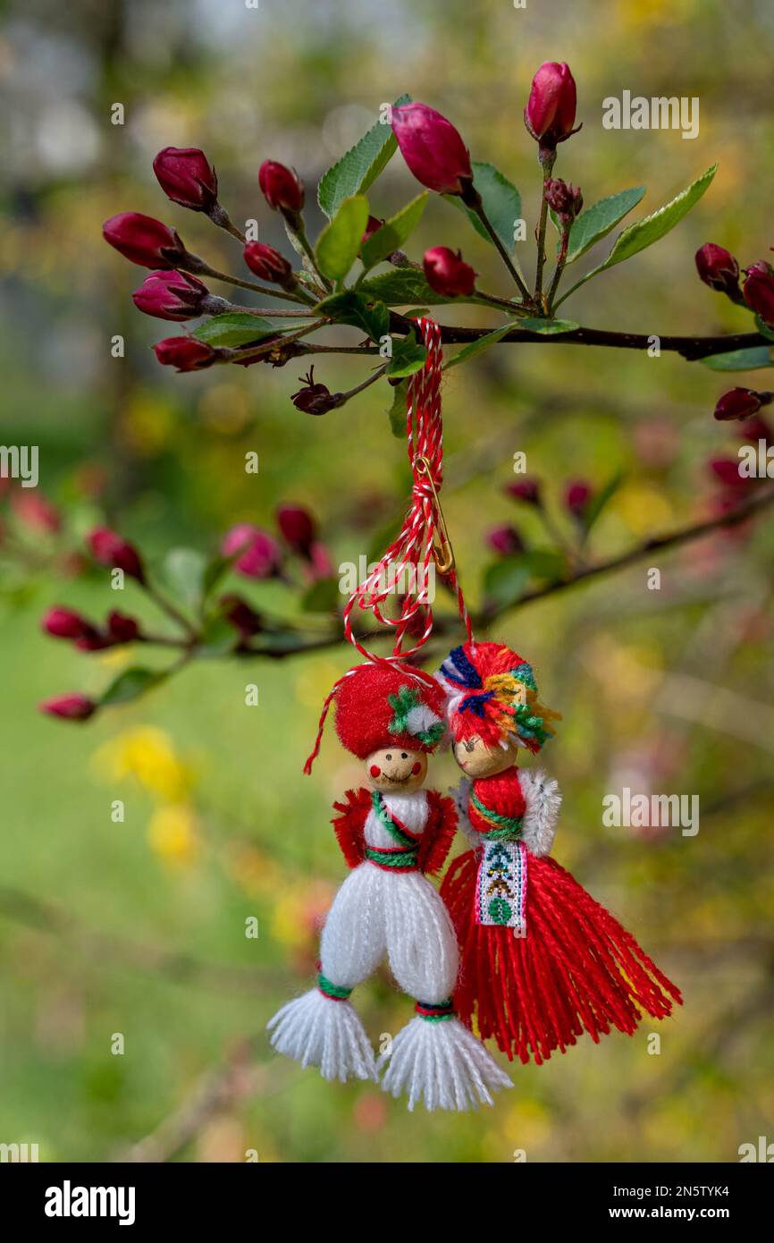 Greeting card background for the arrival of spring. Red-white man and ...