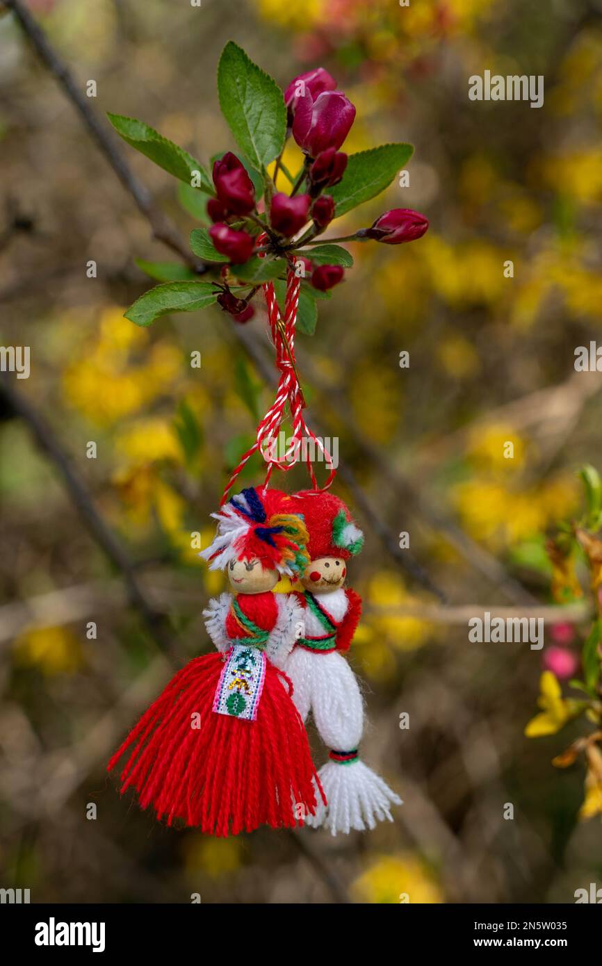 Greeting card background for the arrival of spring. Red-white man and ...