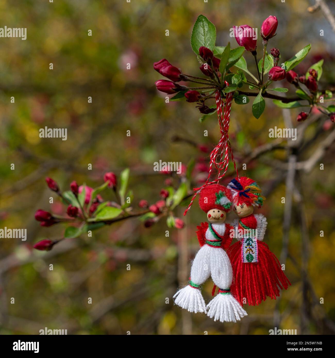 Greeting card background for the arrival of spring. Red-white man and ...