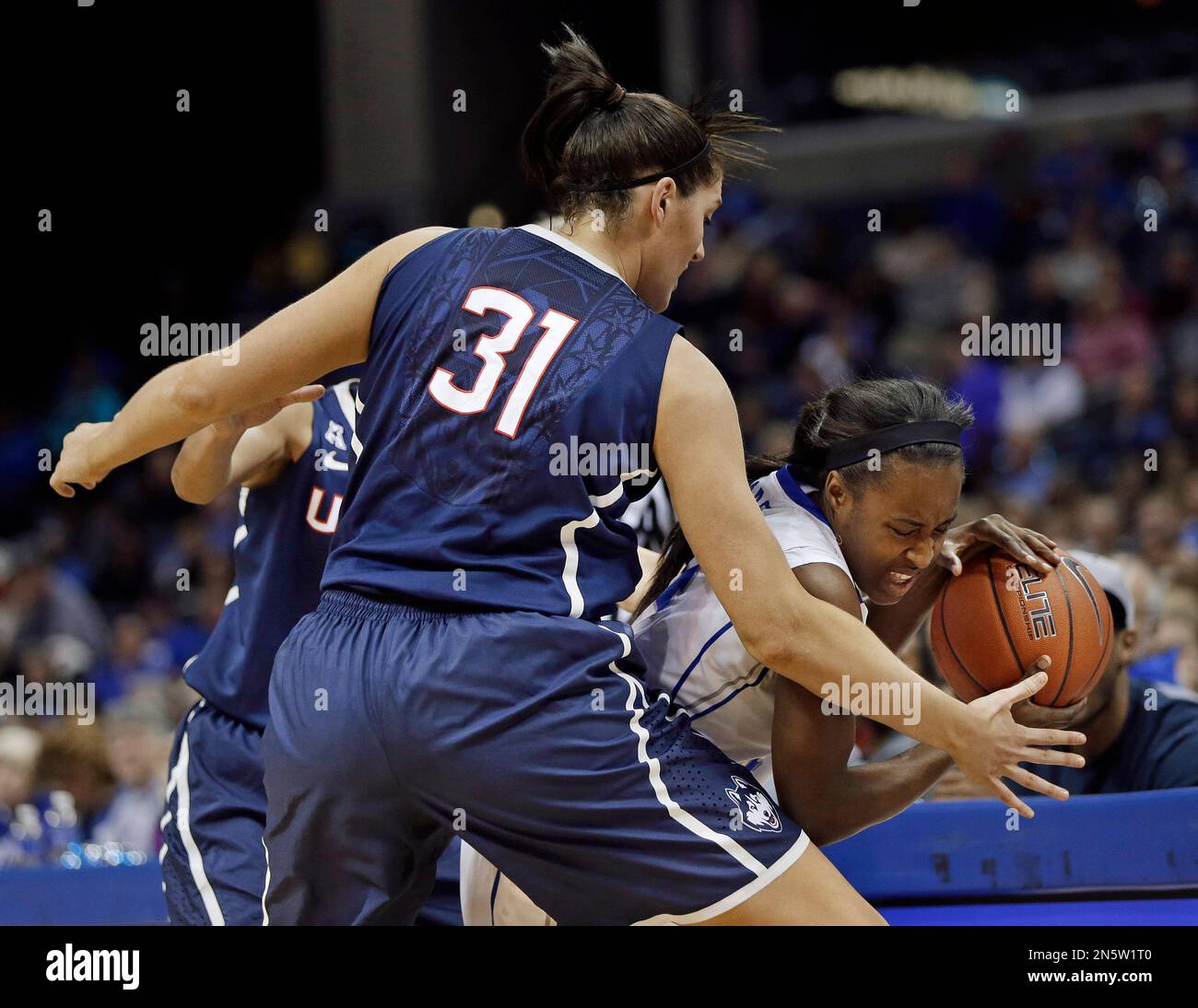 Connecticut center Stefanie Dolson (31) blocks the path of Memphis ...