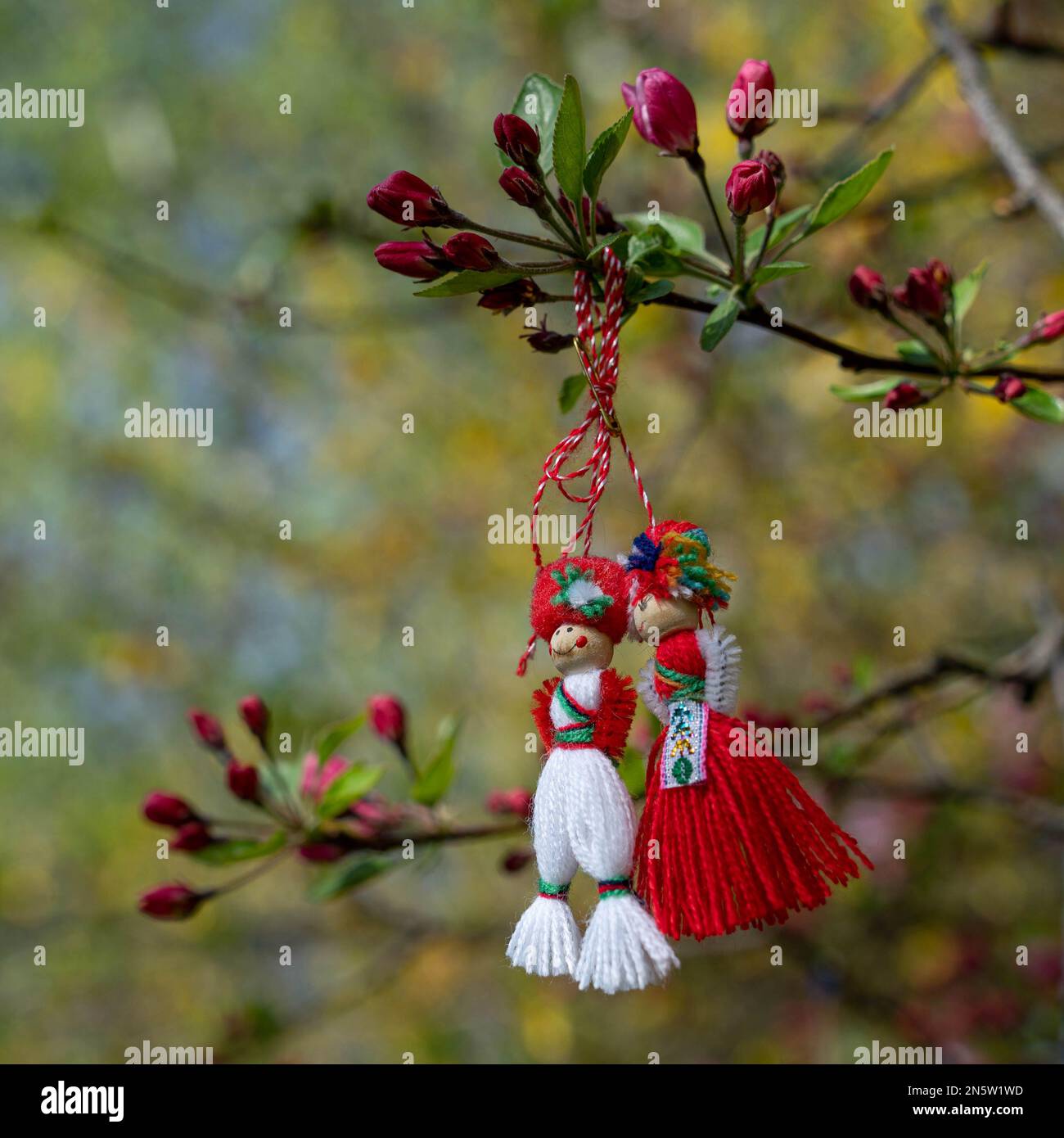 Greeting card background for the arrival of spring. Red-white man and ...
