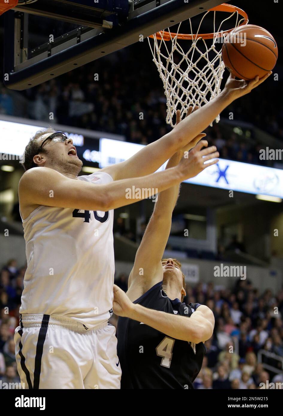 Xavier center Matt Stainbrook (40) shoots against Butler forward Erik ...