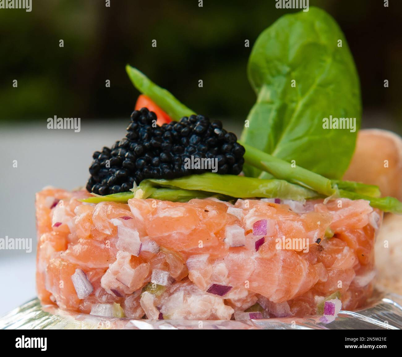 salmon tartare with basil caviary Stock Photo - Alamy