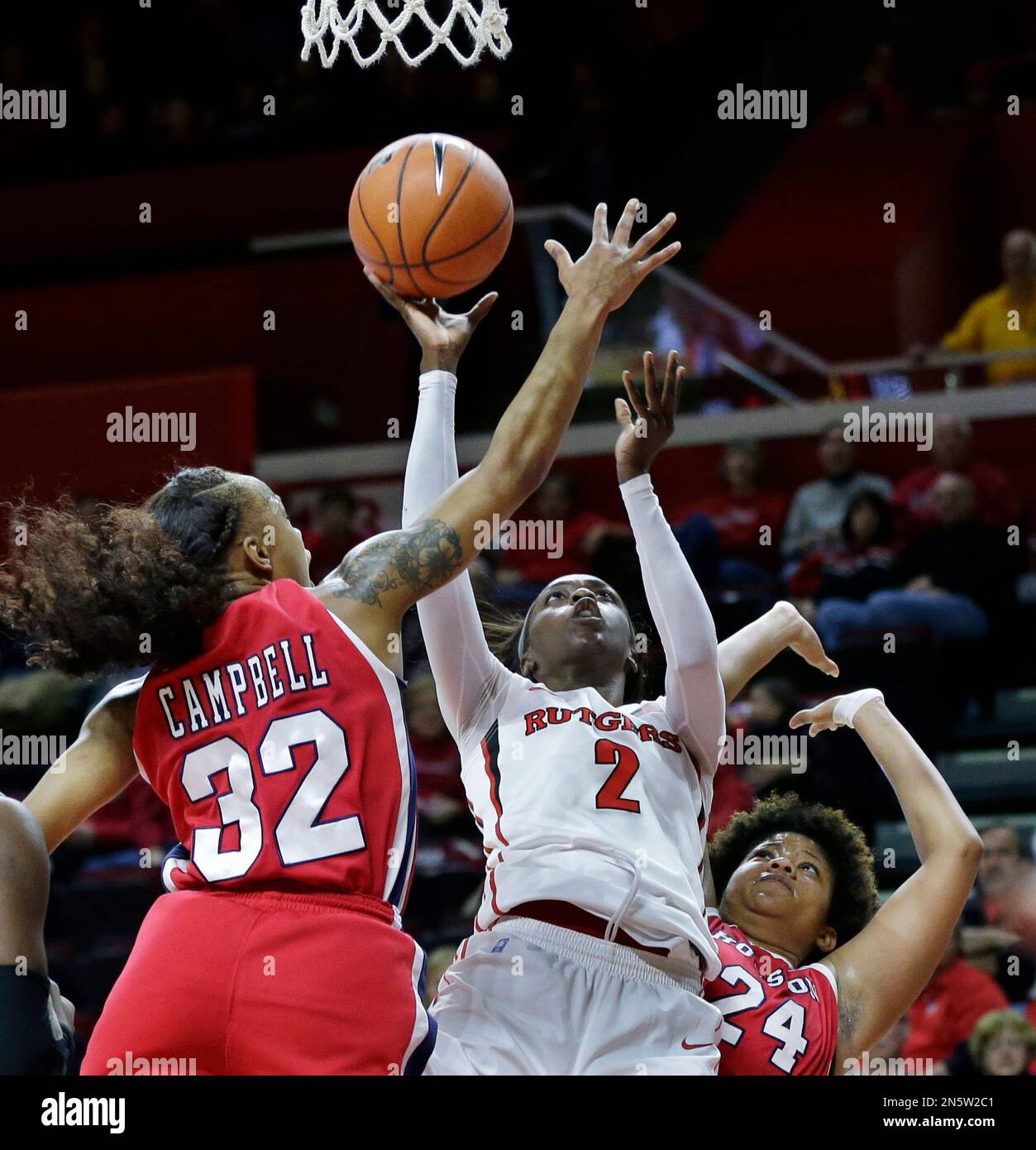 Rutgers forward Kahleah Copper (2) takes a shot between Houston ...