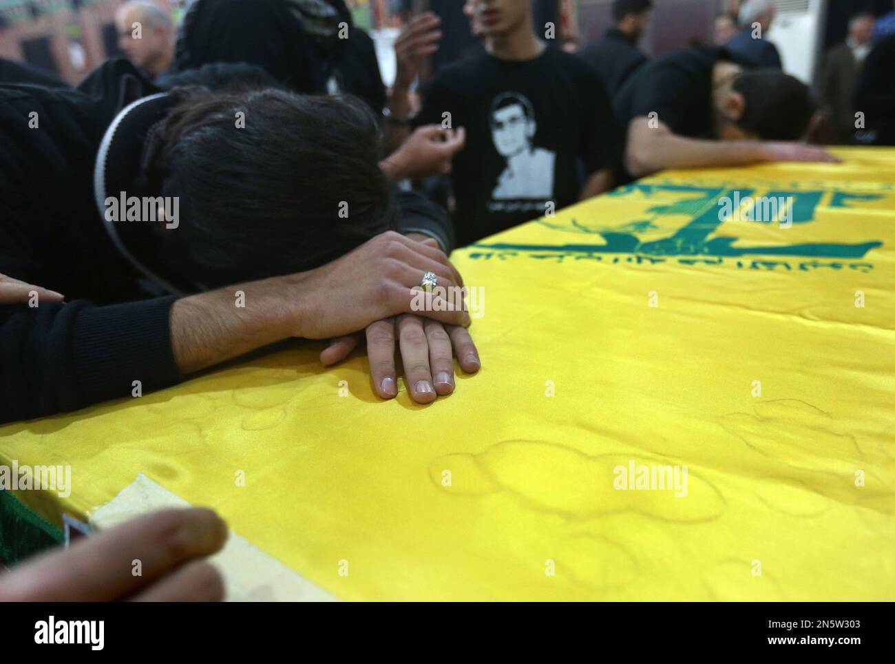 Friends of Ali Khadra, who was killed Thursday by a bomb explosion ...