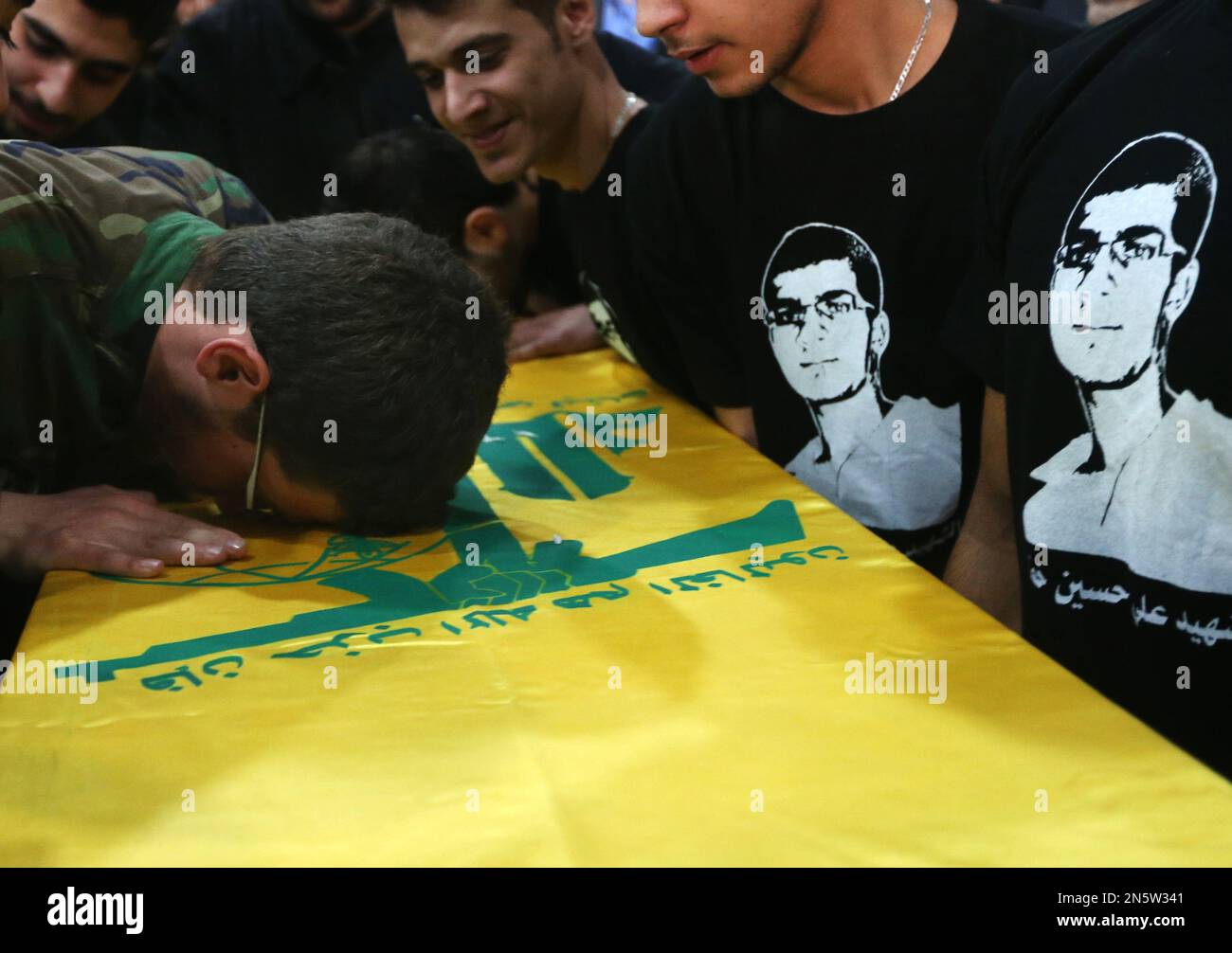 The brother of Ali Khadra, left, who was killed Thursday by a bomb ...