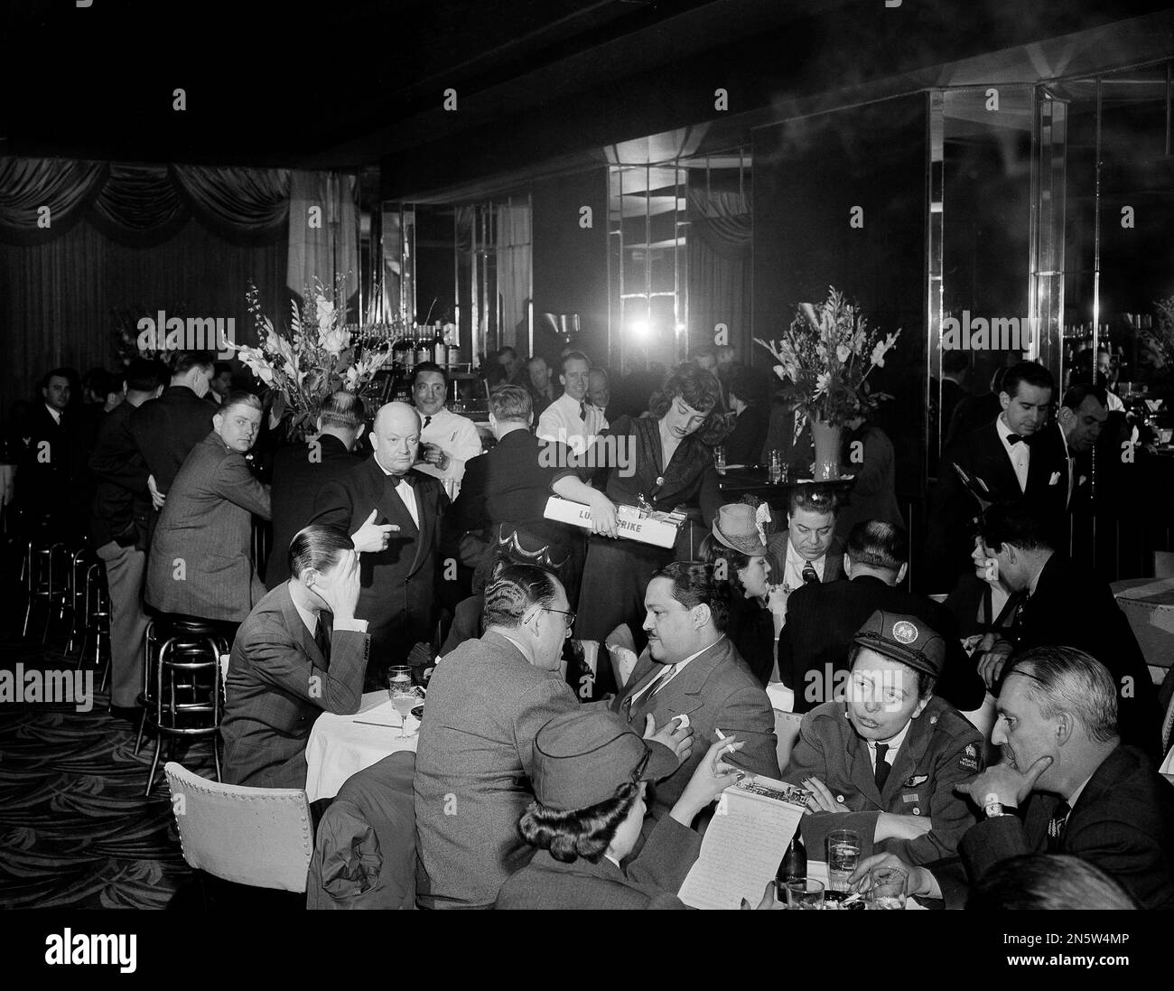 Bar and table crowd at The Stork Club in New York City, April 4, 1944 ...