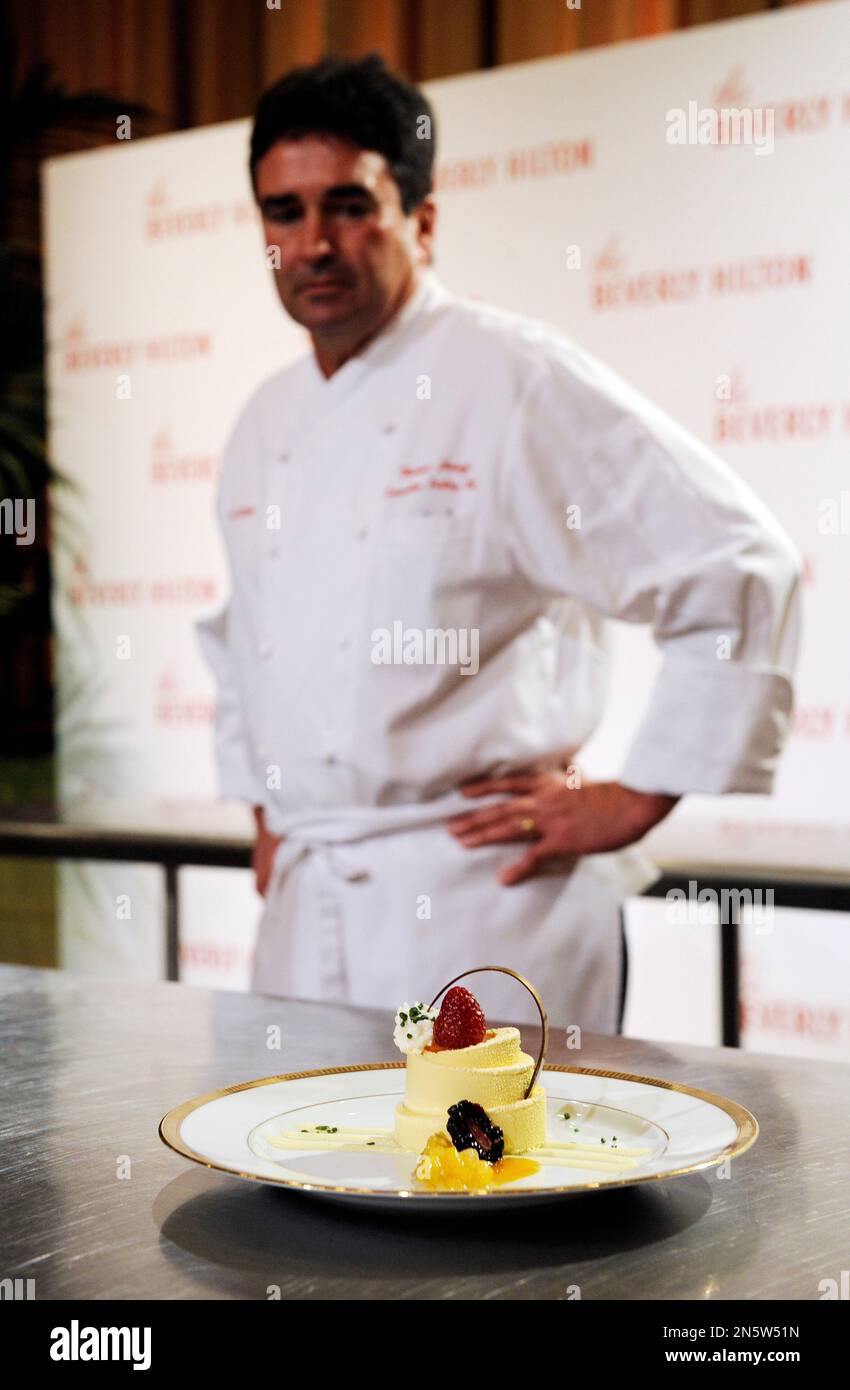 Executive Pastry Chef Thomas Henzi stands behind his Gusto Mango ...