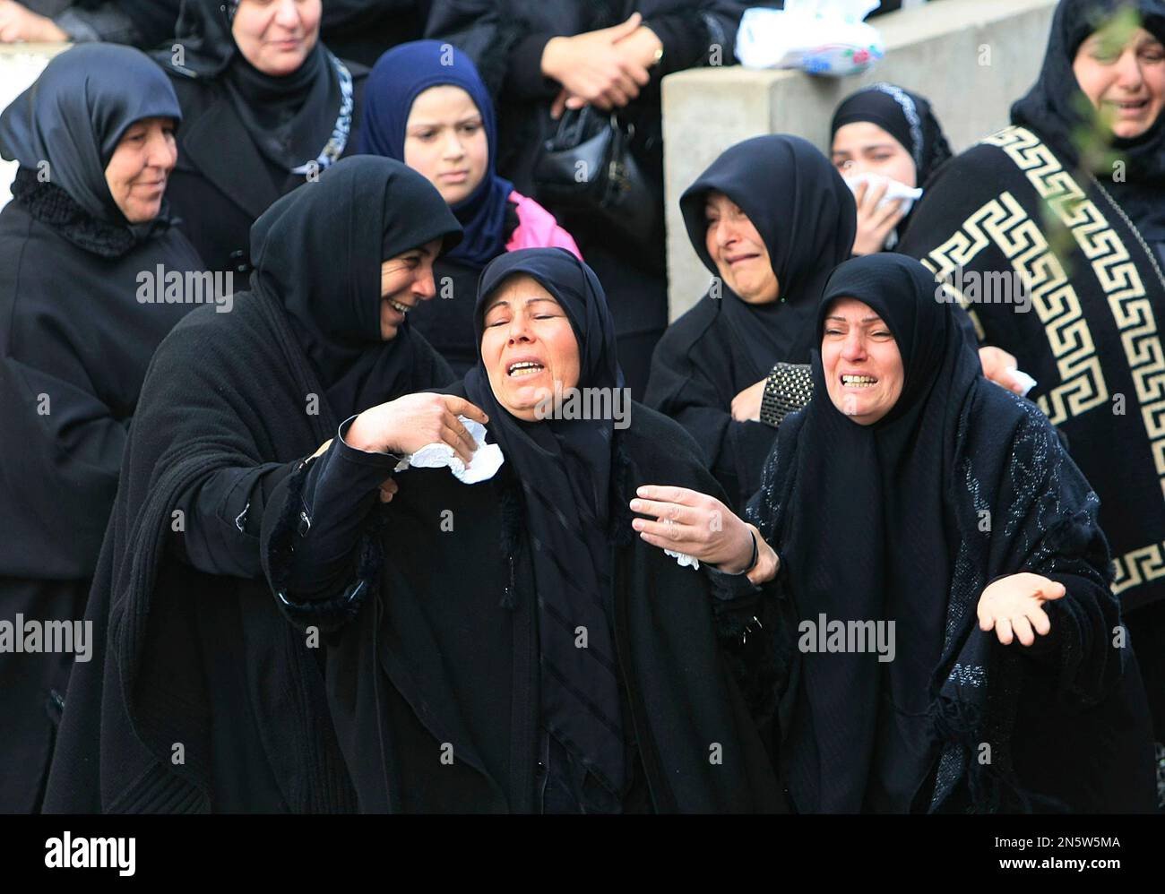Lebanese women mourn during the funeral procession of Iman Zahweh and ...