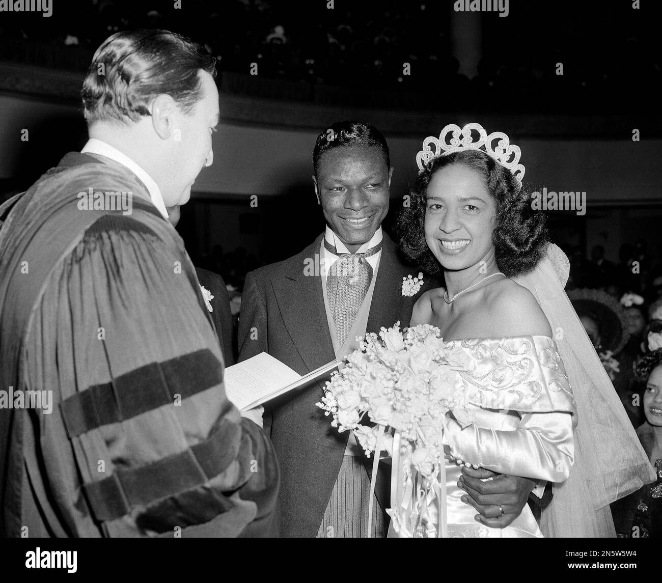 Nat "King" Cole of jukebox fame and singer Maria Hawkins Ellington are ...
