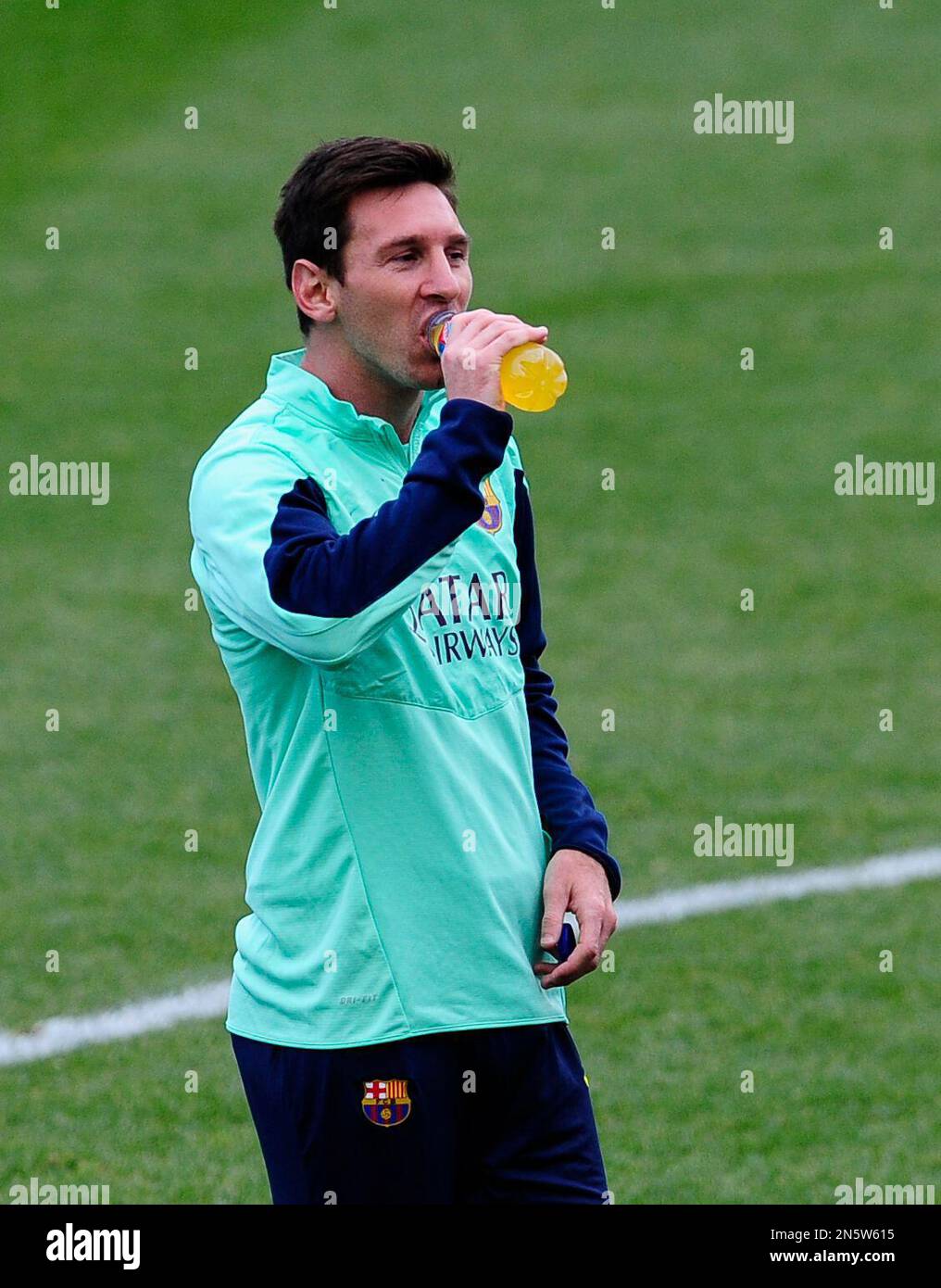 FC Barcelona's Lionel Messi, from Argentina, takes a drink during a ...