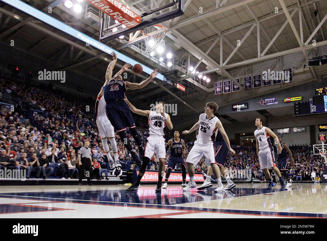 St. Mary’s Beau Levesque (15) fights for a rebound against Gonzaga’s ...