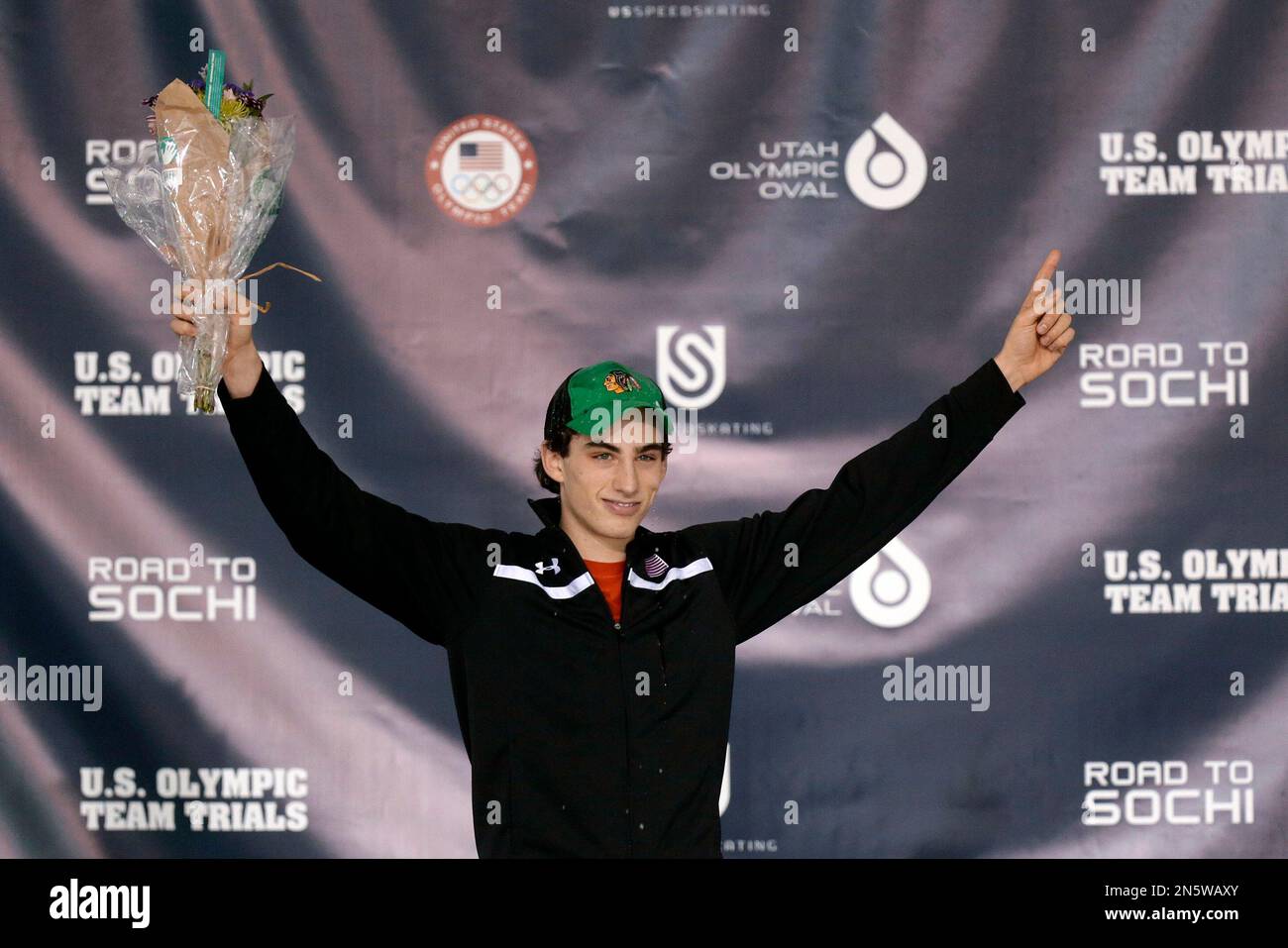 Emery Lehman celebrates on the podium following his win in the men's ...