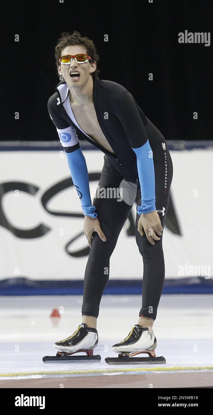 Emery Lehman looks up after competing in the men's 10,000 meters during ...