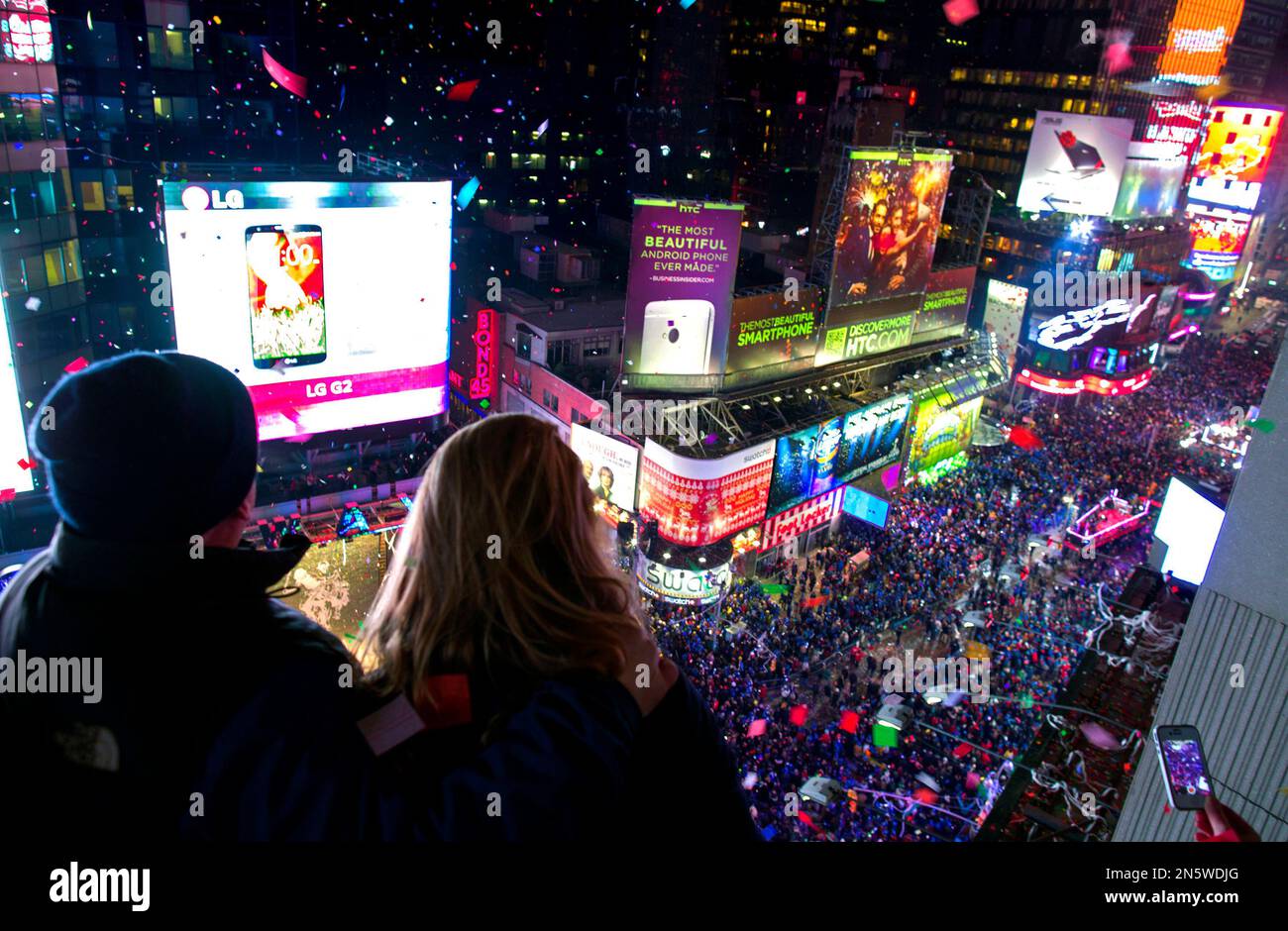 Kenn Magowan, left, Anna Edgerly-Moore, both of New York, look out over ...