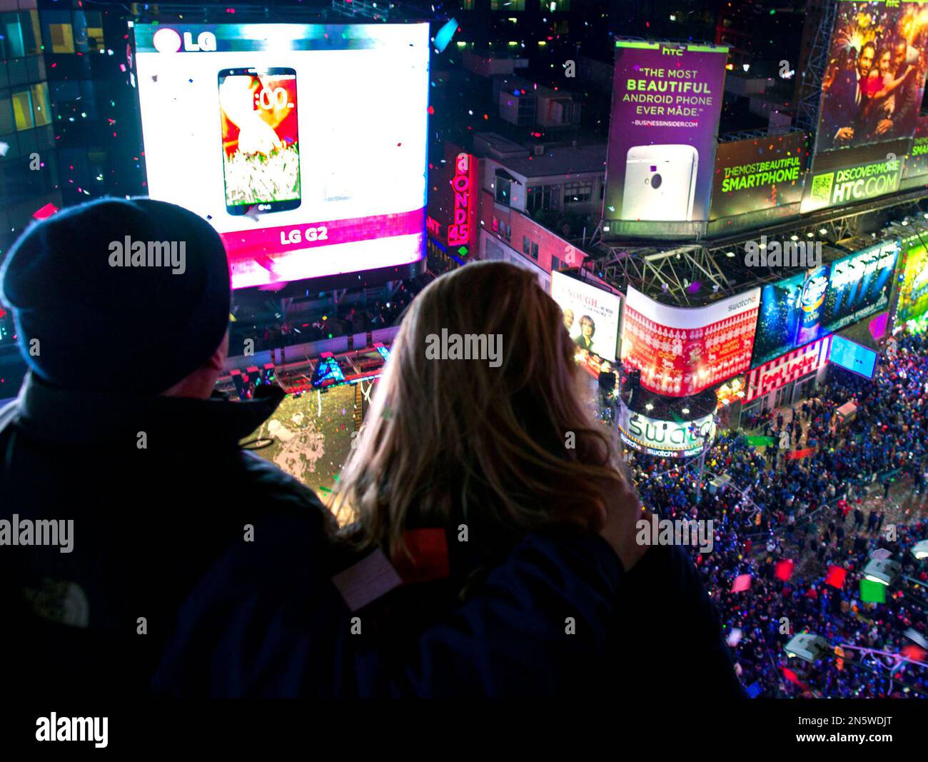 Kenn Magowan, left, Anna Edgerly-Moore, both of New York, look out over ...