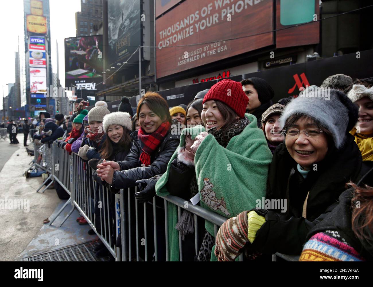 Tourists from Japan, including Hiroko Baba, of Tokyo, bundled in a ...