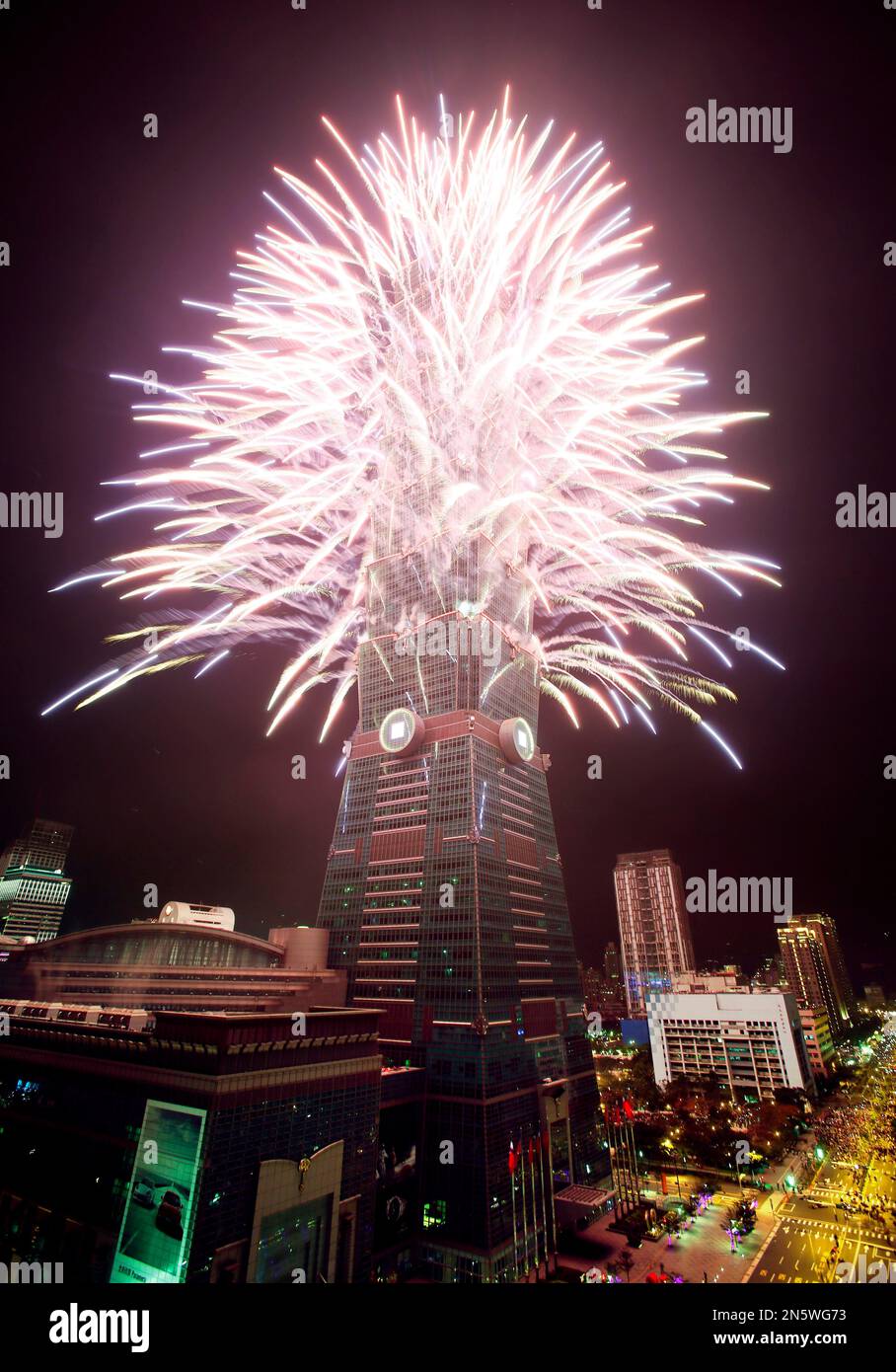 A fireworks display is set off from the Taipei101 skyscraper during New ...