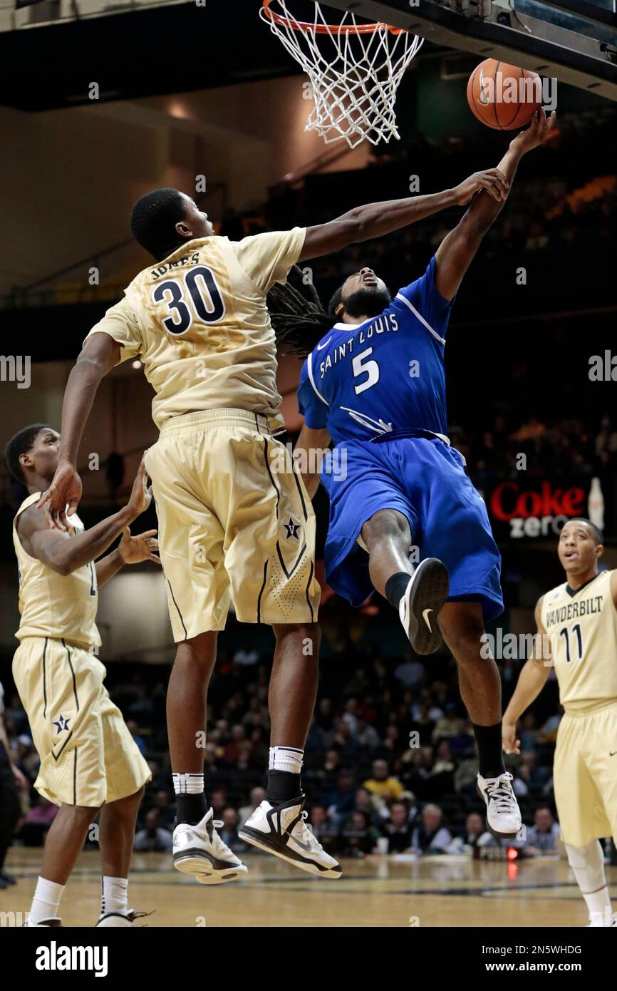 Vanderbilt center Damian Jones (30) fouls Saint Louis guard Jordair ...