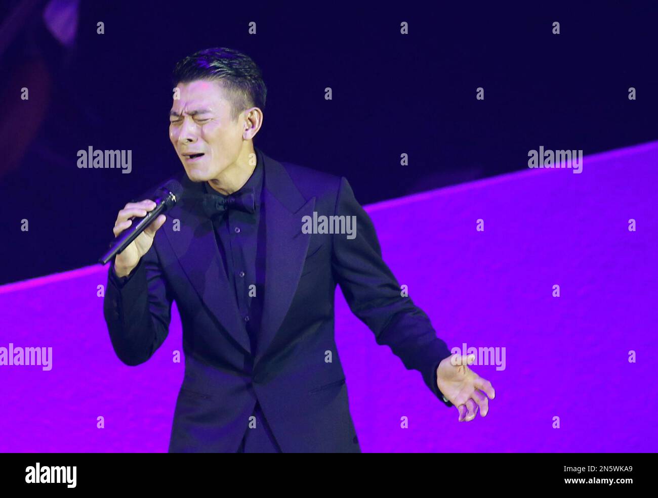 Hong Kong singer-actor Andy Lau sings during a memorial concert to mark ...