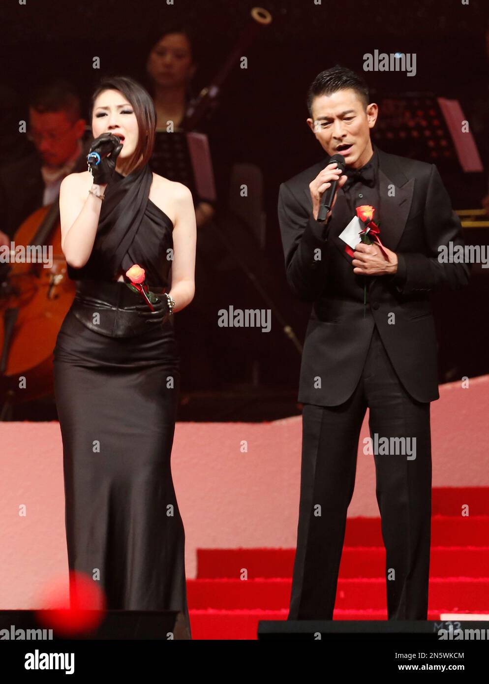 Hong Kong performing artists Miriam Yeung, left, and Andy Lau sing ...