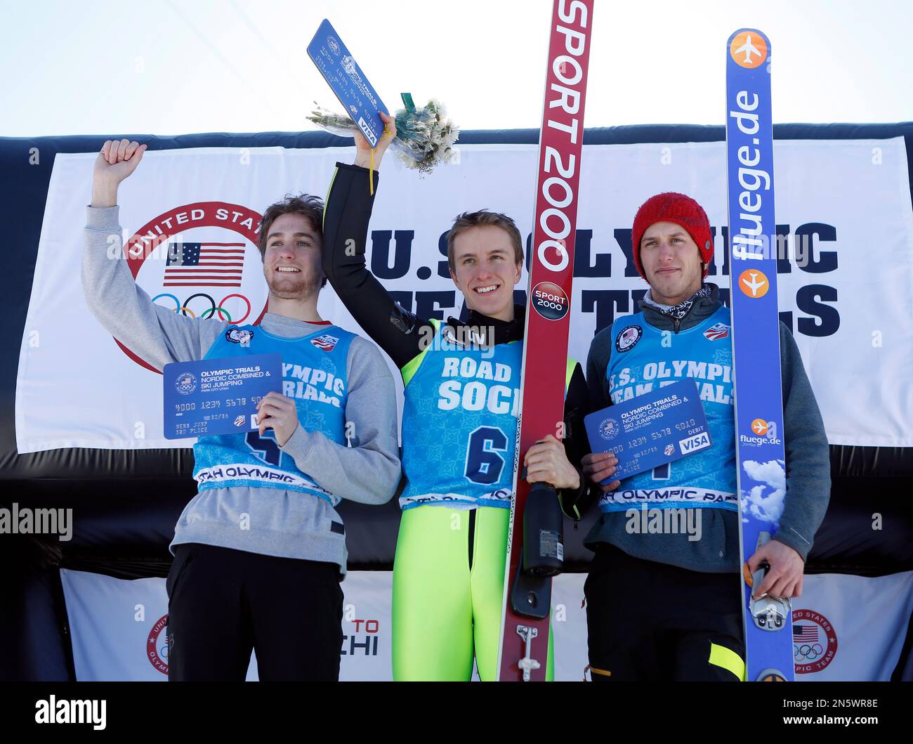 First-place finisher Nicholas Fairall, center, second-place finisher ...