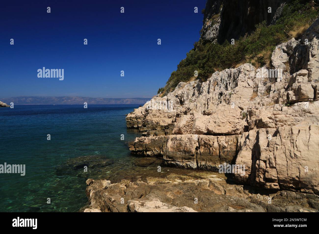 Beach and coastline in Vela Stiniva, Hvar island, Croatia Stock Photo ...