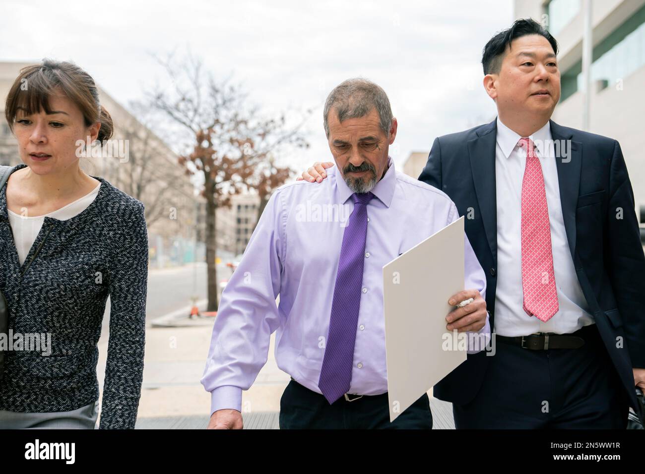 Kevin Seefried leaves the federal courthouse with his lawyers, Thursday ...