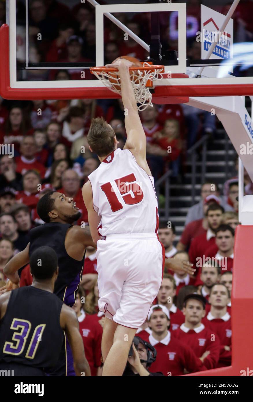 Wisconsin's Sam Dekker dunks over Prairie View's Hershey Robinson and ...