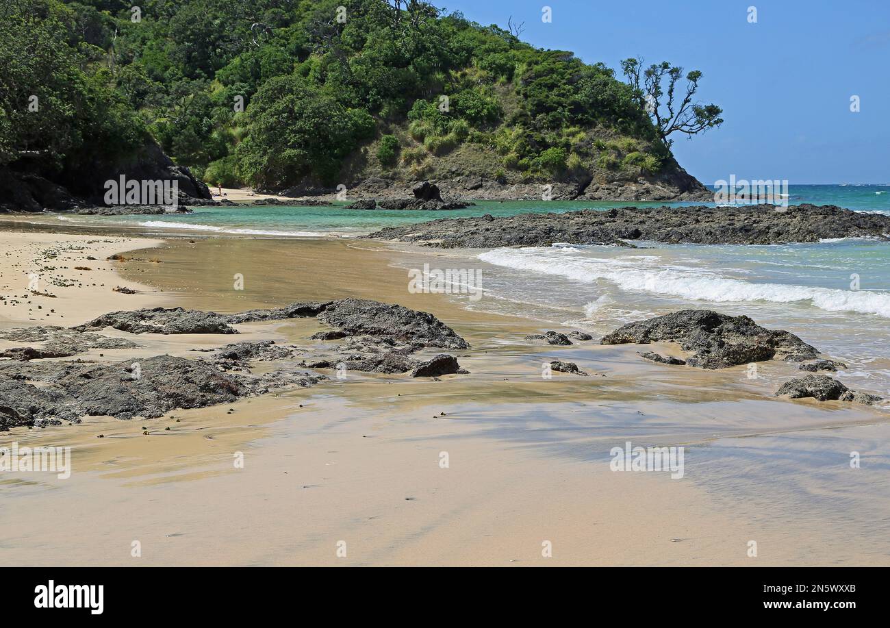 Volcanic rock on Matapouri Beach - New Zealand Stock Photo - Alamy